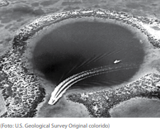 ETEC 2014/1 Um grande círculo azul escuro no meio do mar turquesa do ...